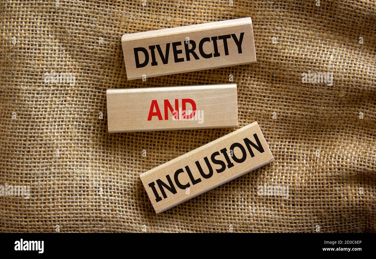 Wooden blocks form the text 'divercity and inclusion' on beautiful ...