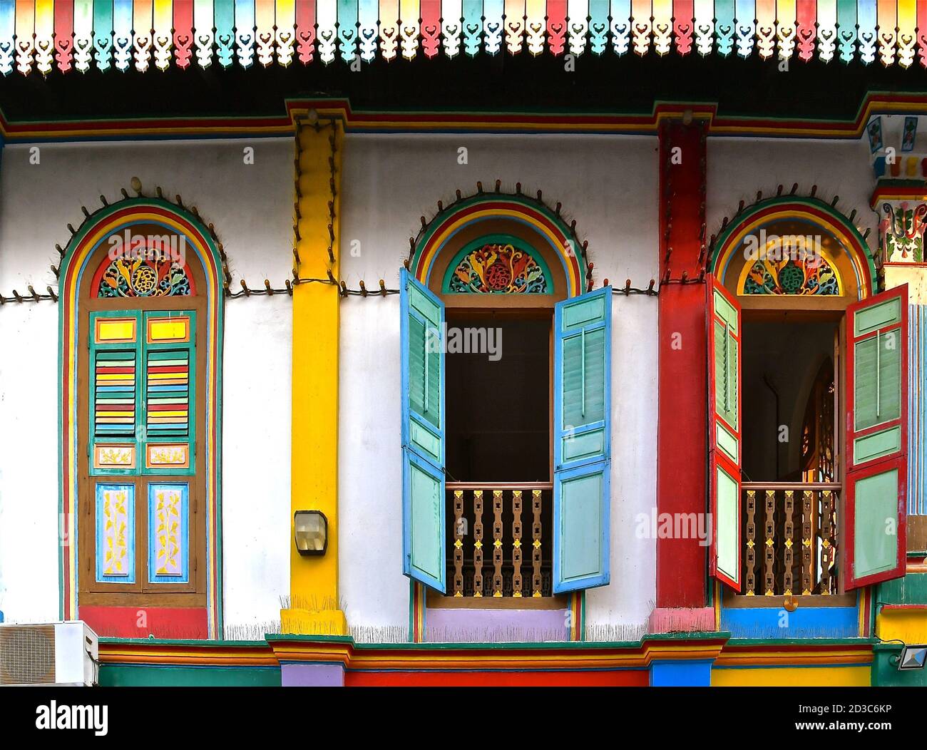 Colourful wooden shutters on a restored historical building in Little ...