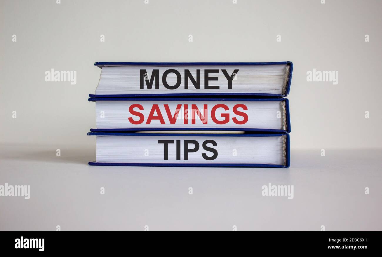 Books with text 'money savings tips' on beautiful white background ...