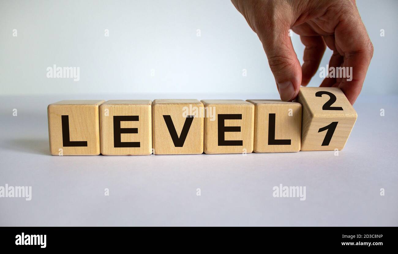 Time for Level 2. Hand is turning a cube and changes the word 'level 1 ...