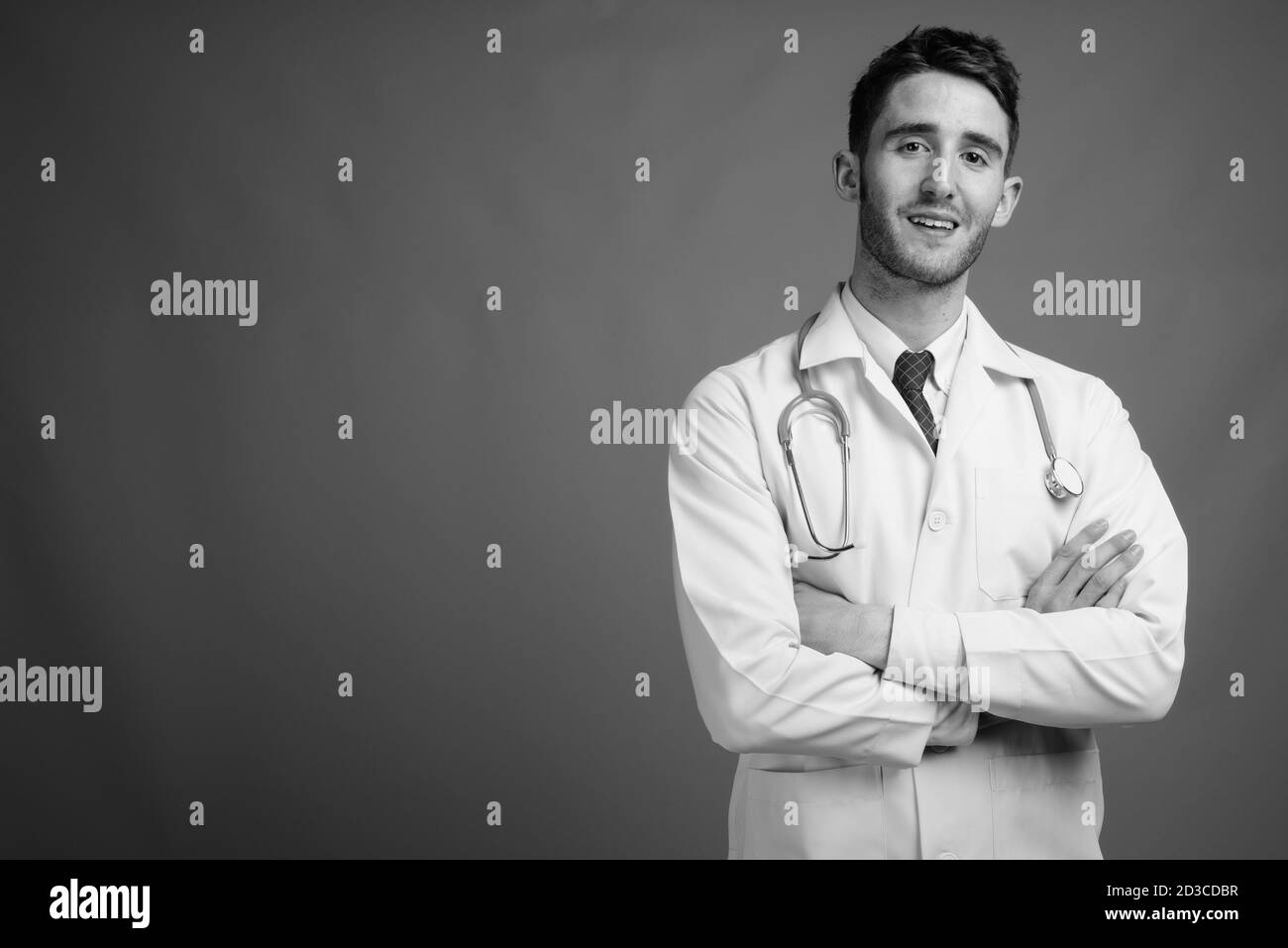 Happy confident doctor man Black and White Stock Photos & Images - Alamy
