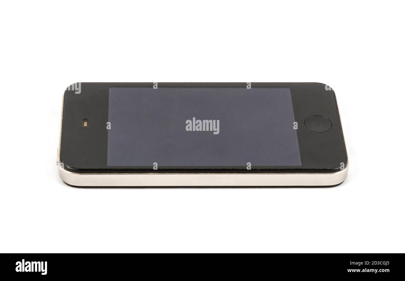 Modern smartphone with blank black screen, lies on the surface ...