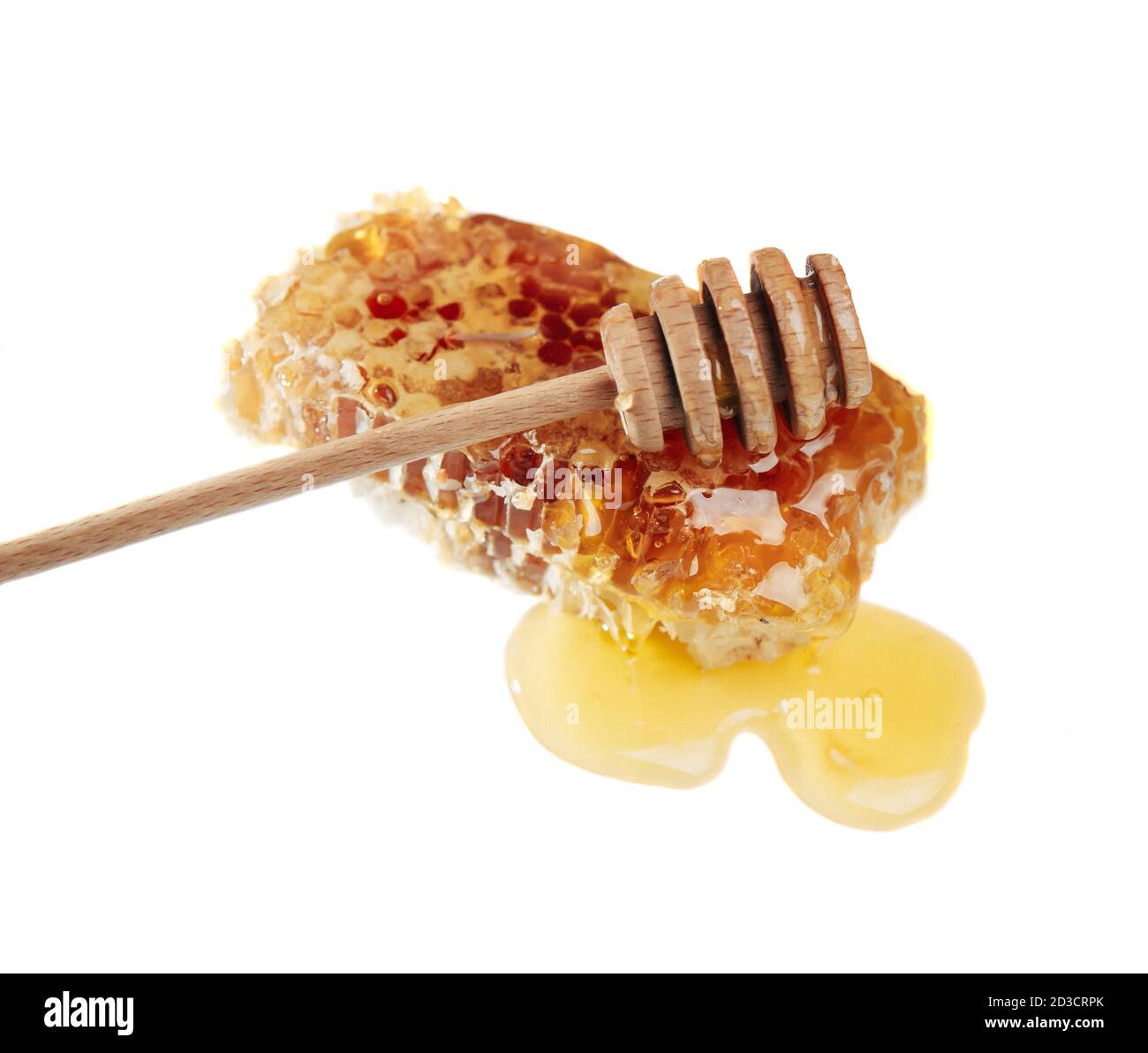 Honeycomb and honey dipper. Isolated on white background Stock Photo ...