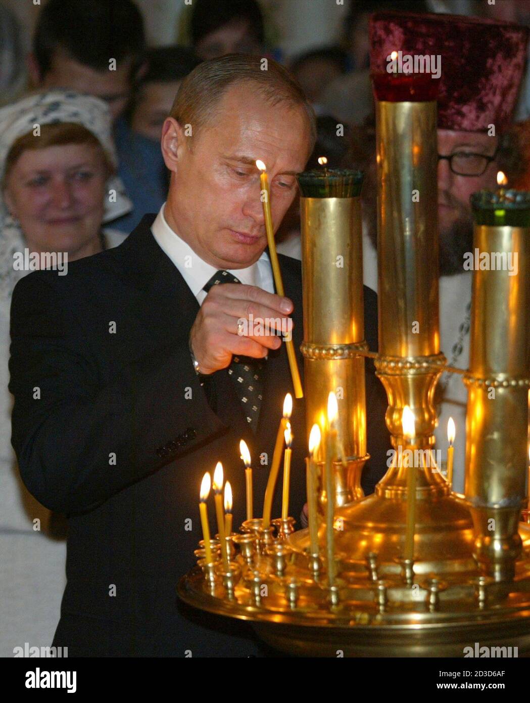 Russian lights a candle hi-res stock photography and images - Alamy