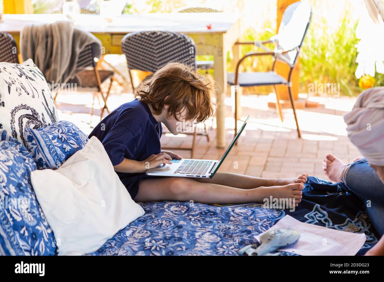 Homework laptop on her bed hi-res stock photography and images - Alamy