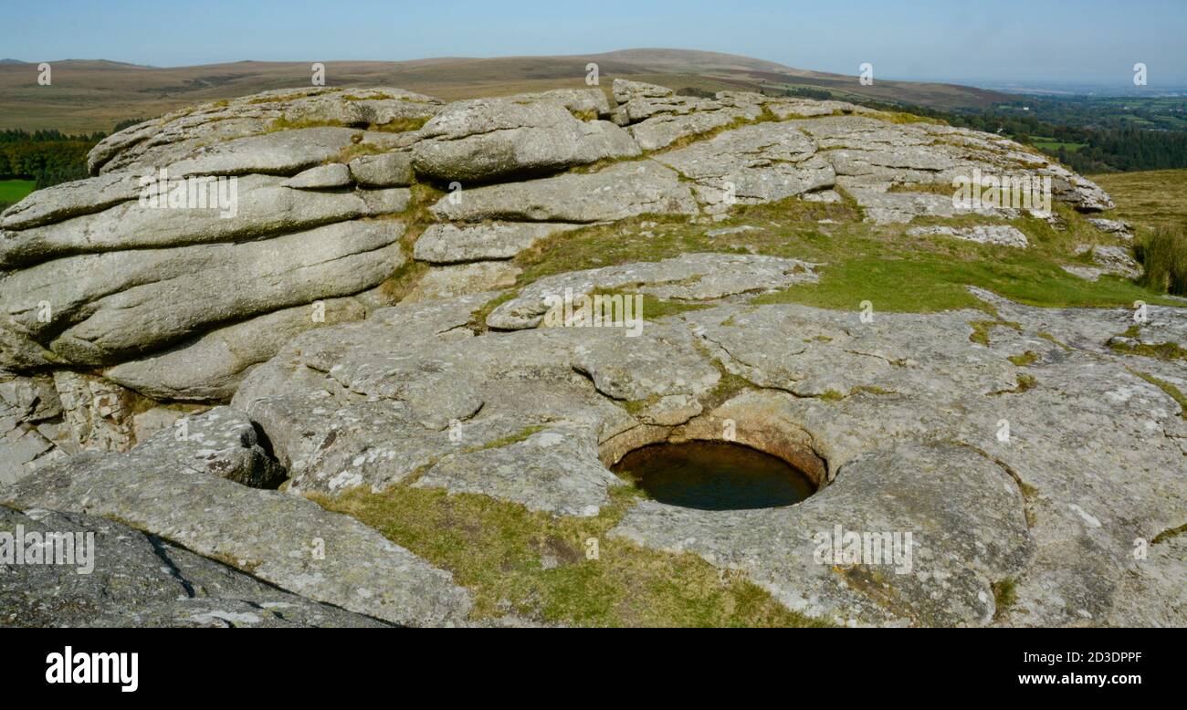 Naturally formed Rock Basin at Kestor Rock on Dartmoor Stock Photo - Alamy