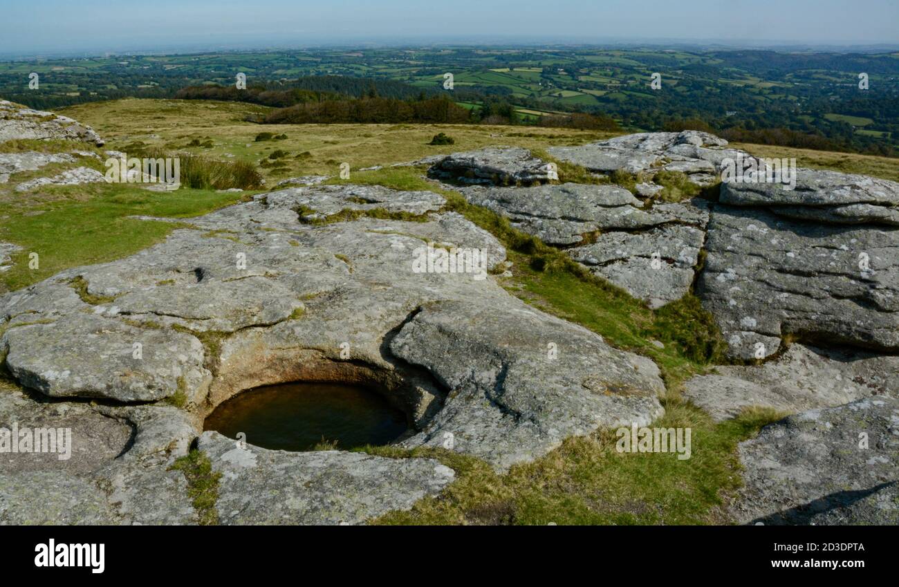 Naturally formed Rock Basin at Kestor Rock on Dartmoor Stock Photo - Alamy