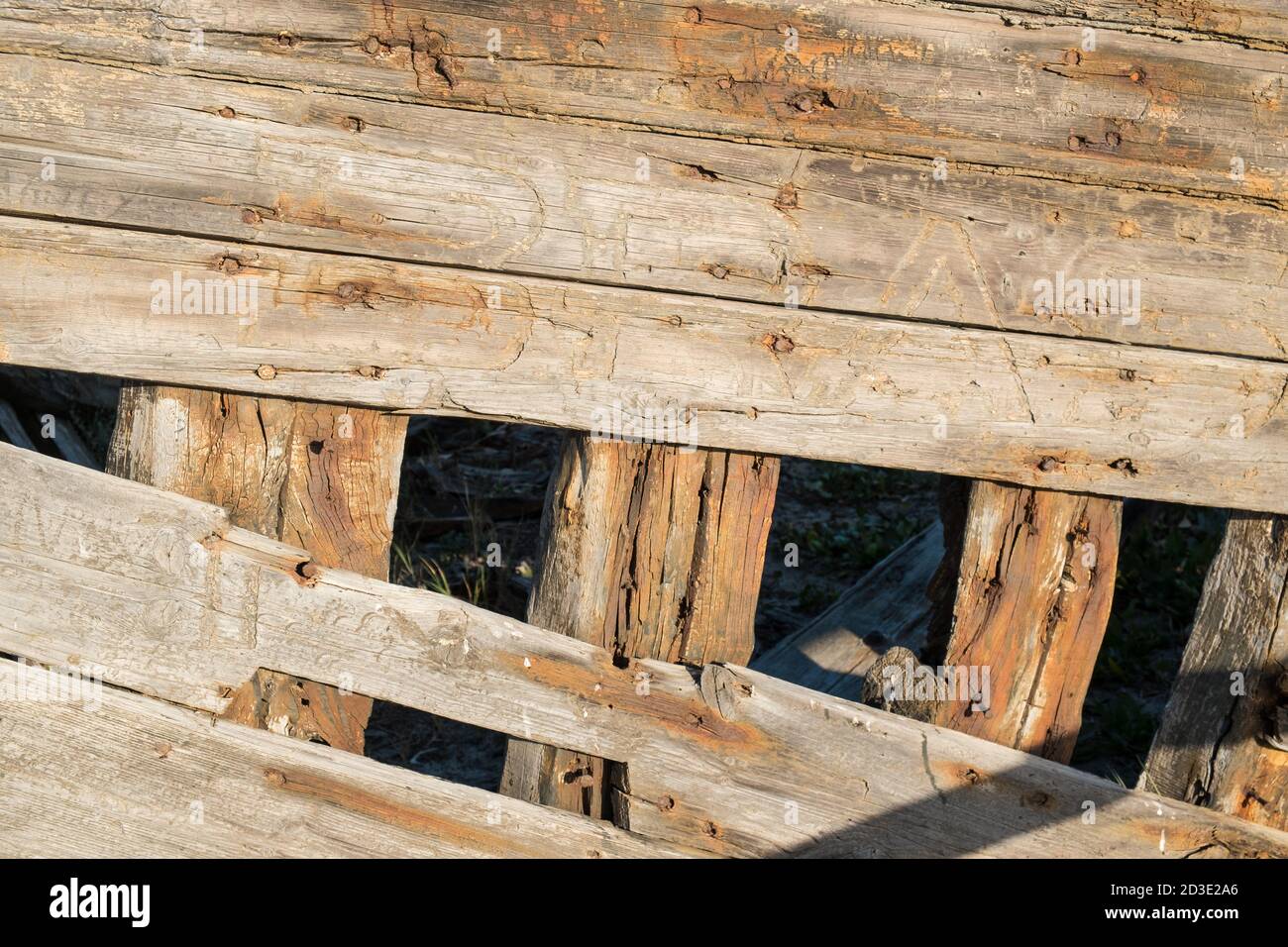 Old ship planks rotting in the sun Stock Photo - Alamy