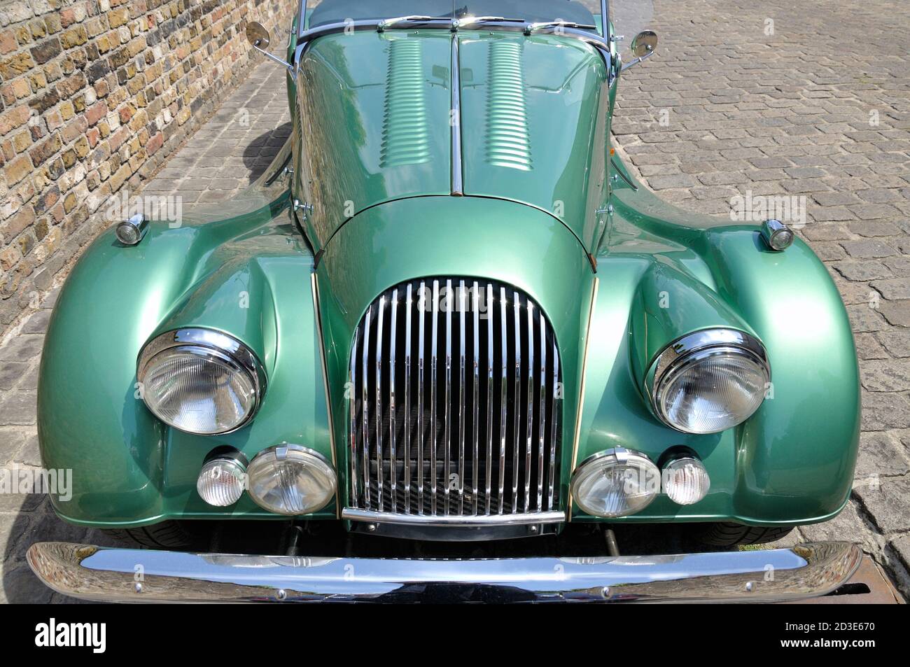 Front view of a green classic car Stock Photo - Alamy