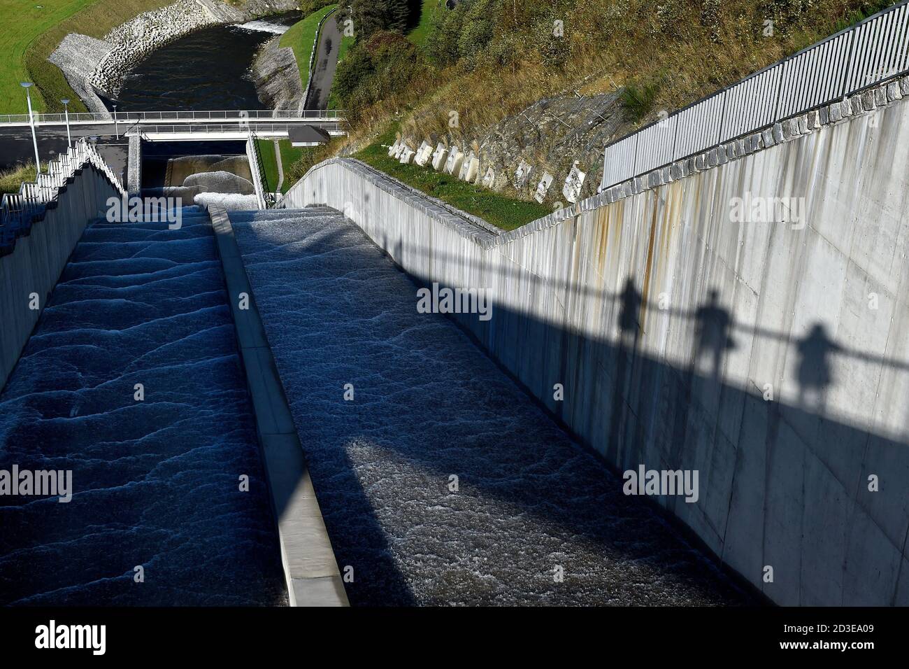 Draining of water over the overflow and slope of the Sance dam on ...
