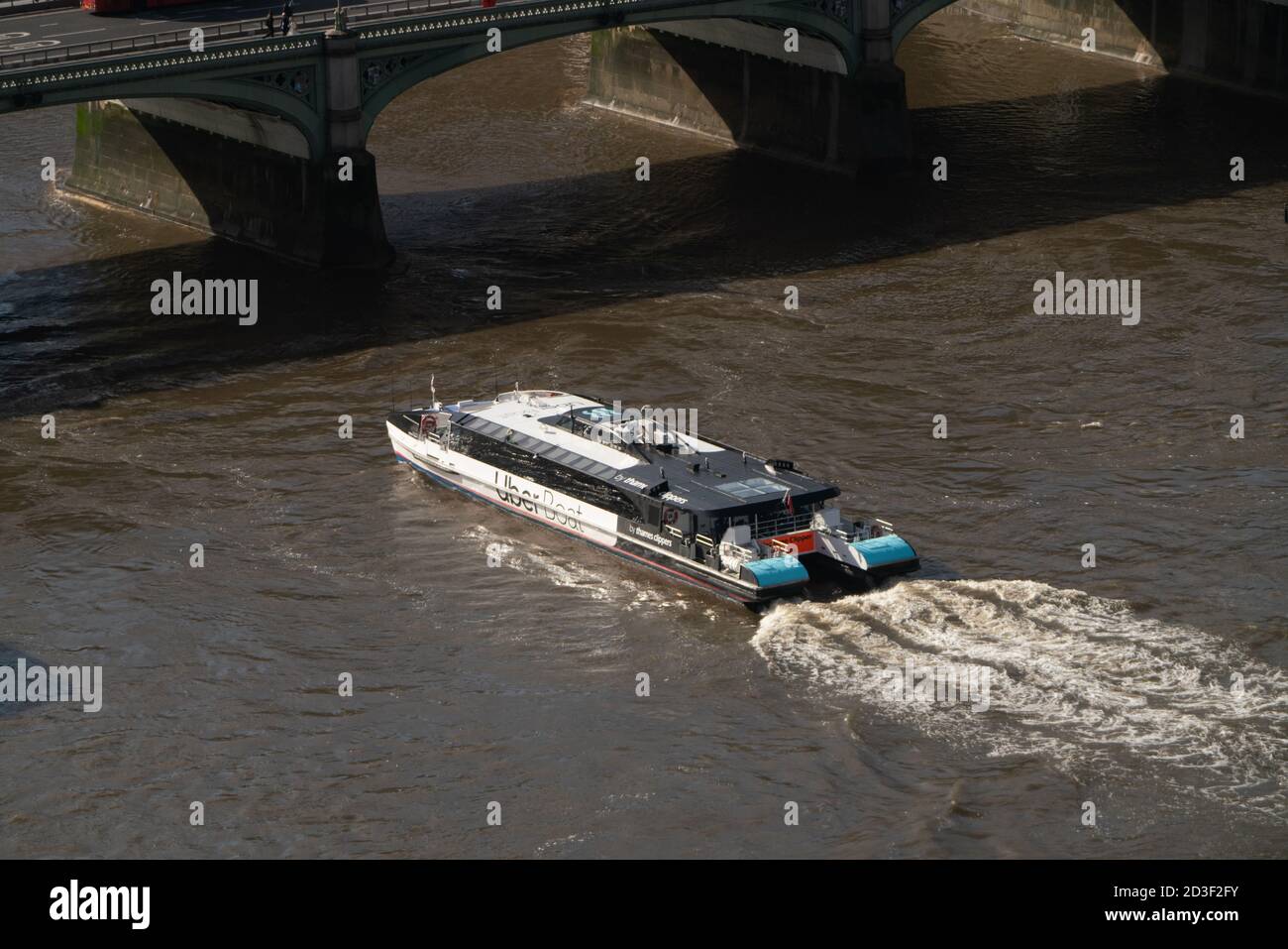 Uber boat by Thames Clippers Stock Photo - Alamy