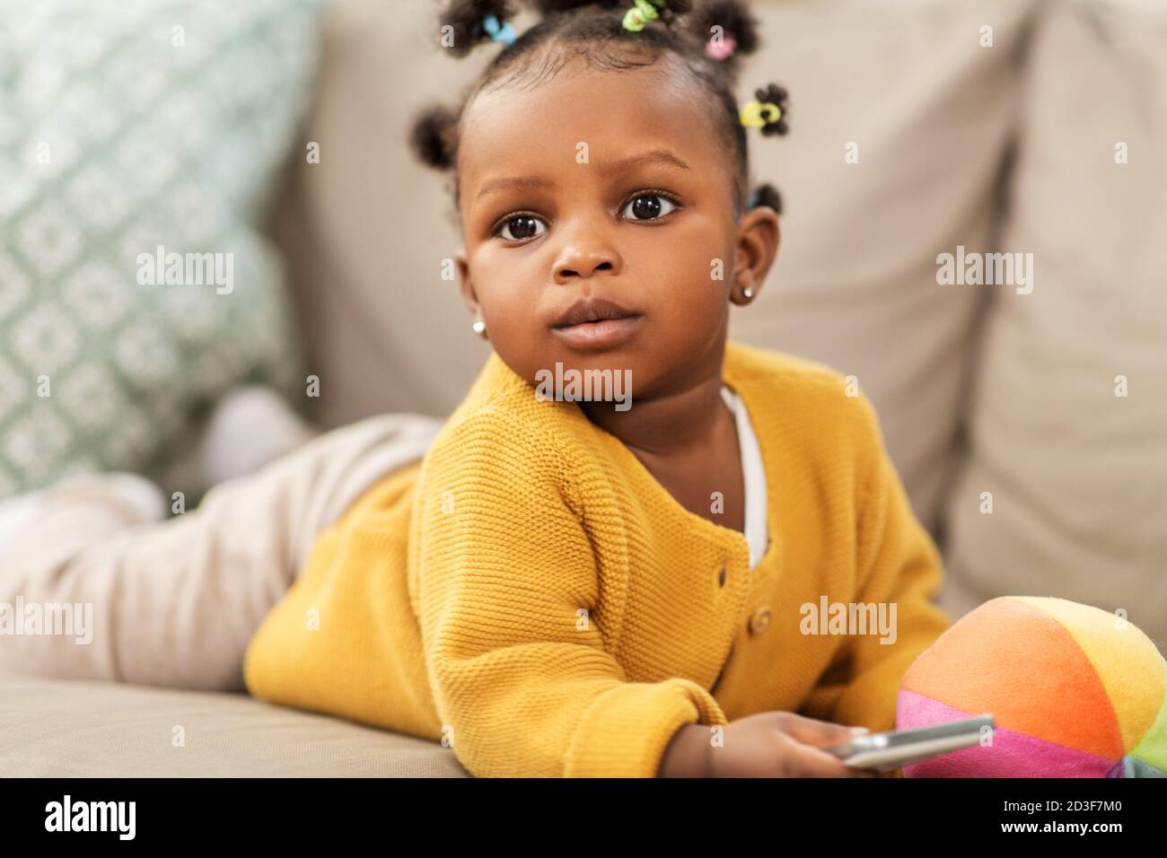 african american baby girl with smartphone at home Stock Photo - Alamy