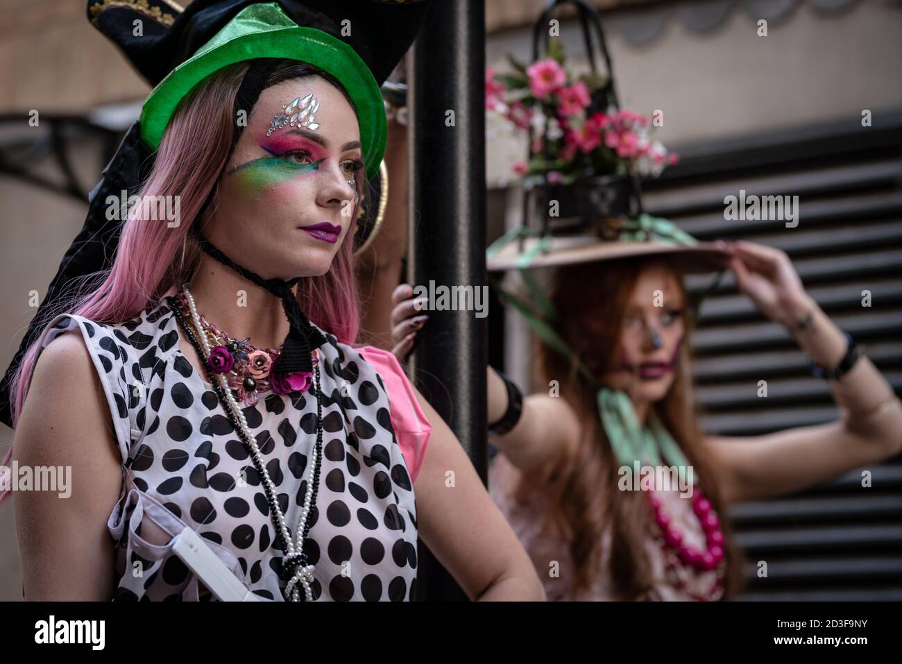 Models take part in a colourful flashmob street fashion show in ...