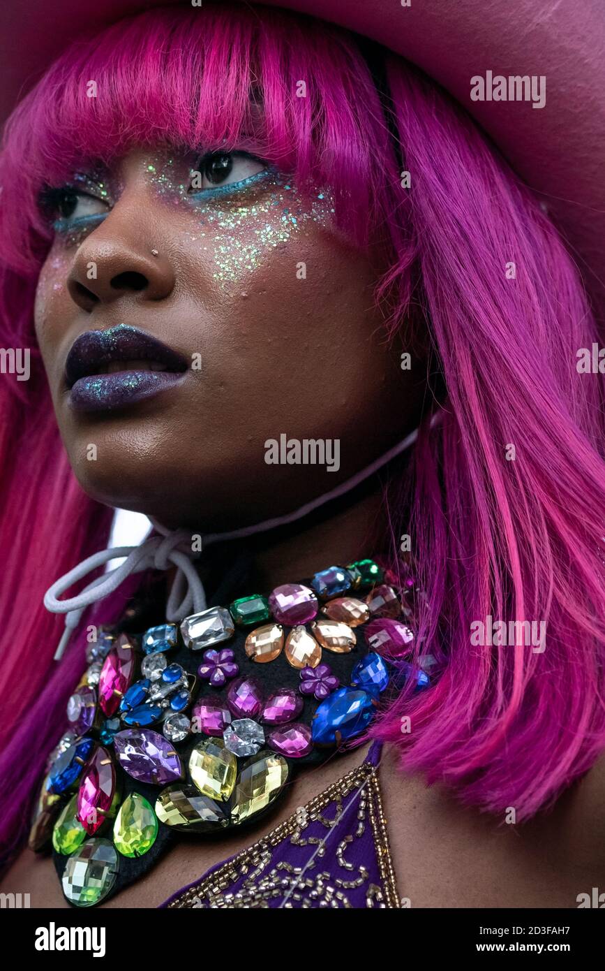 Models take part in a colourful flashmob street fashion show in ...