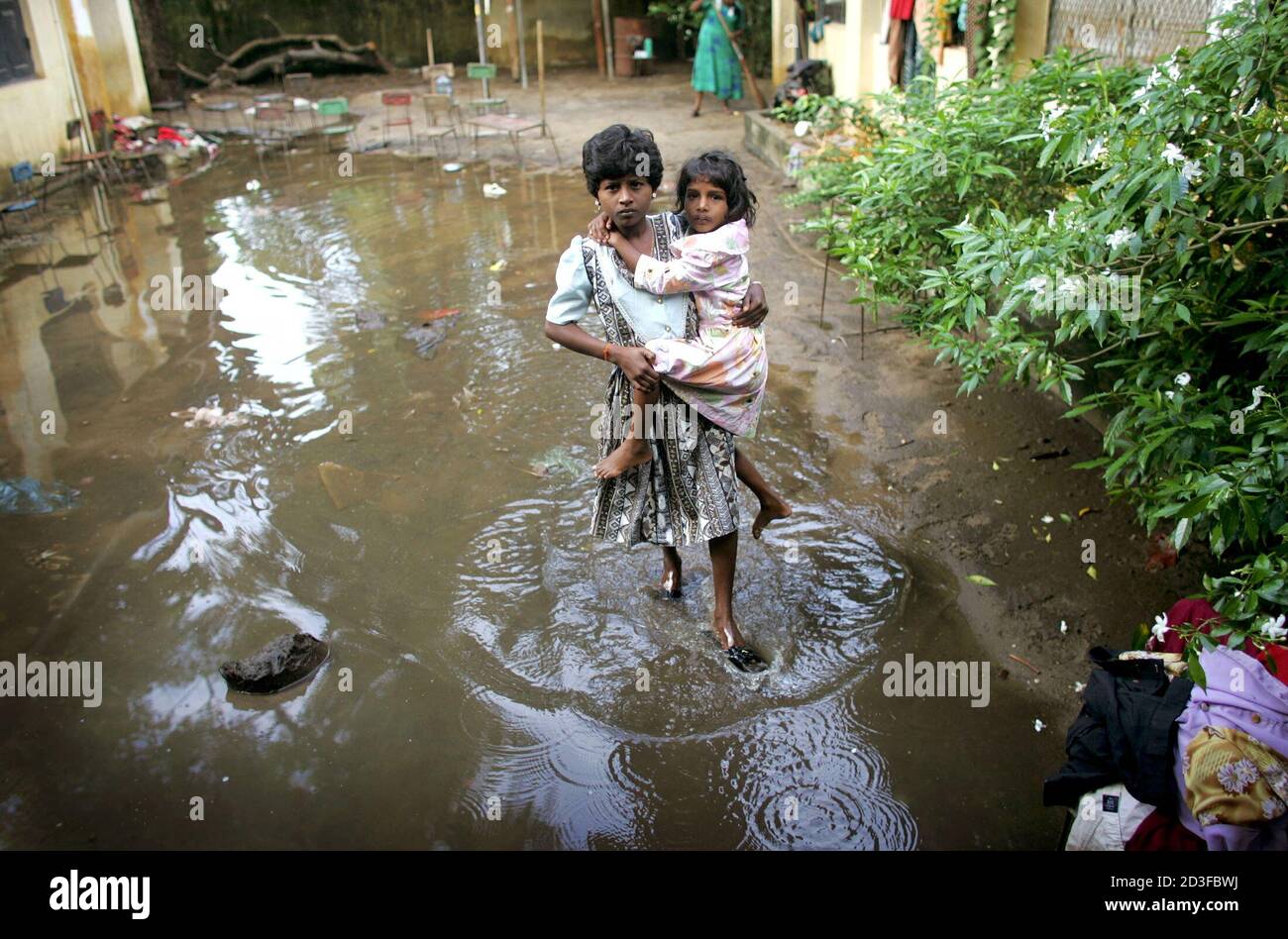 Children in flooded area hi-res stock photography and images - Alamy