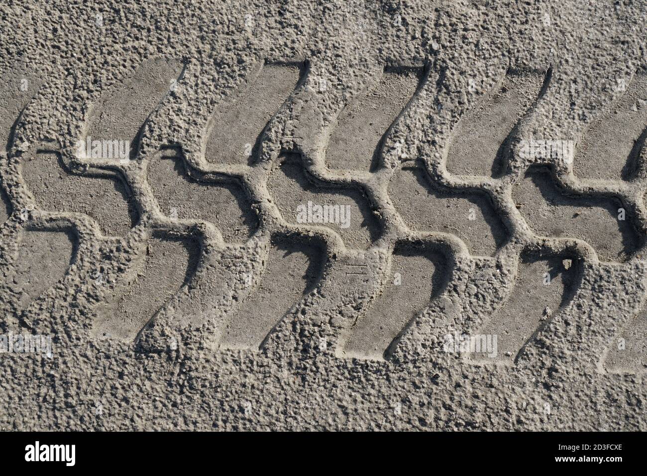 Tyre track in sand. Germany Stock Photo - Alamy
