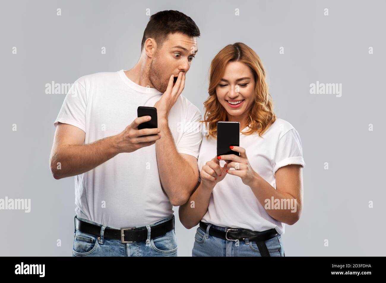 Man woman couple looking shirts hi-res stock photography and images - Alamy