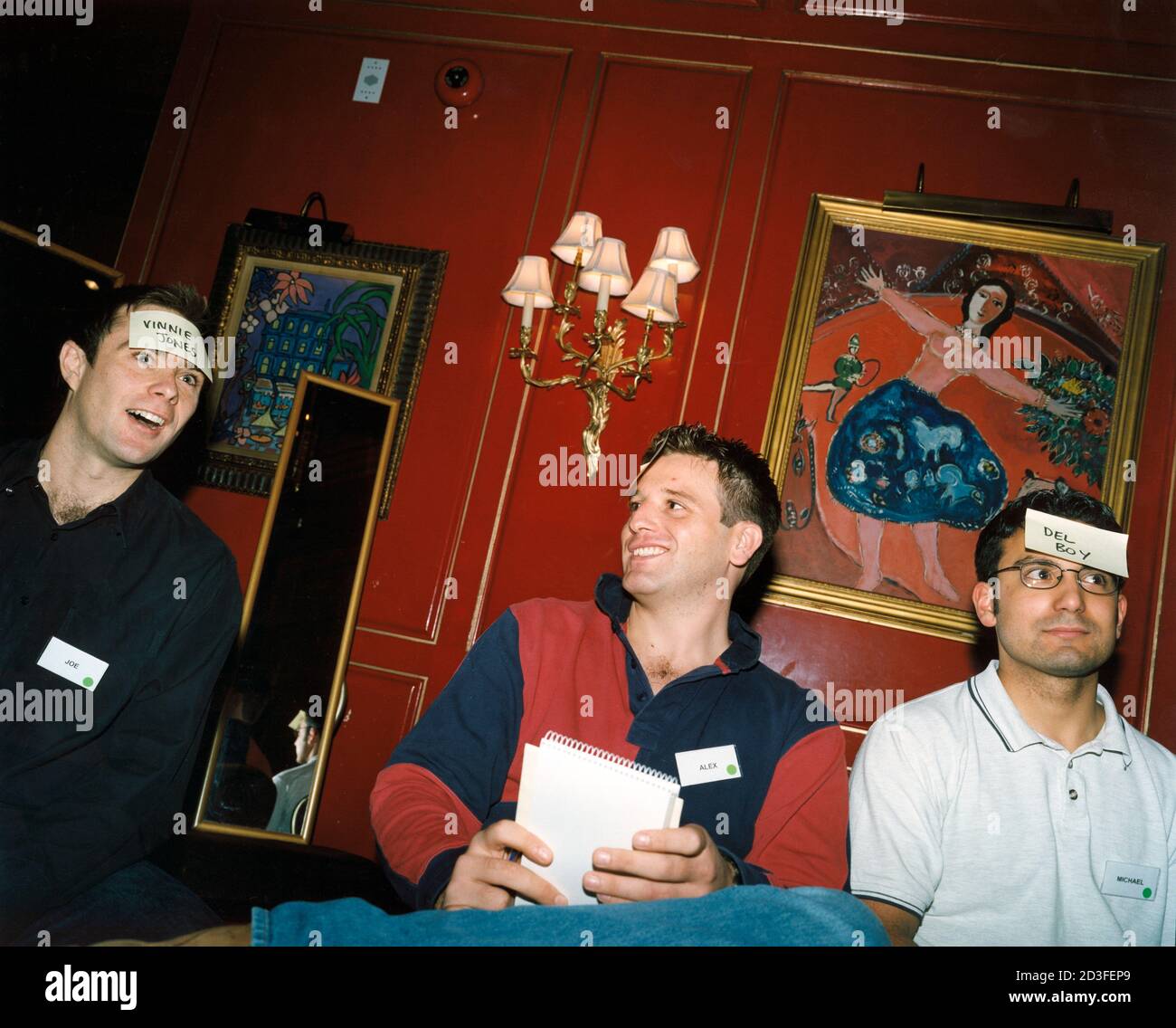 Men play a game to break the ice at a finishing school Stock Photo - Alamy