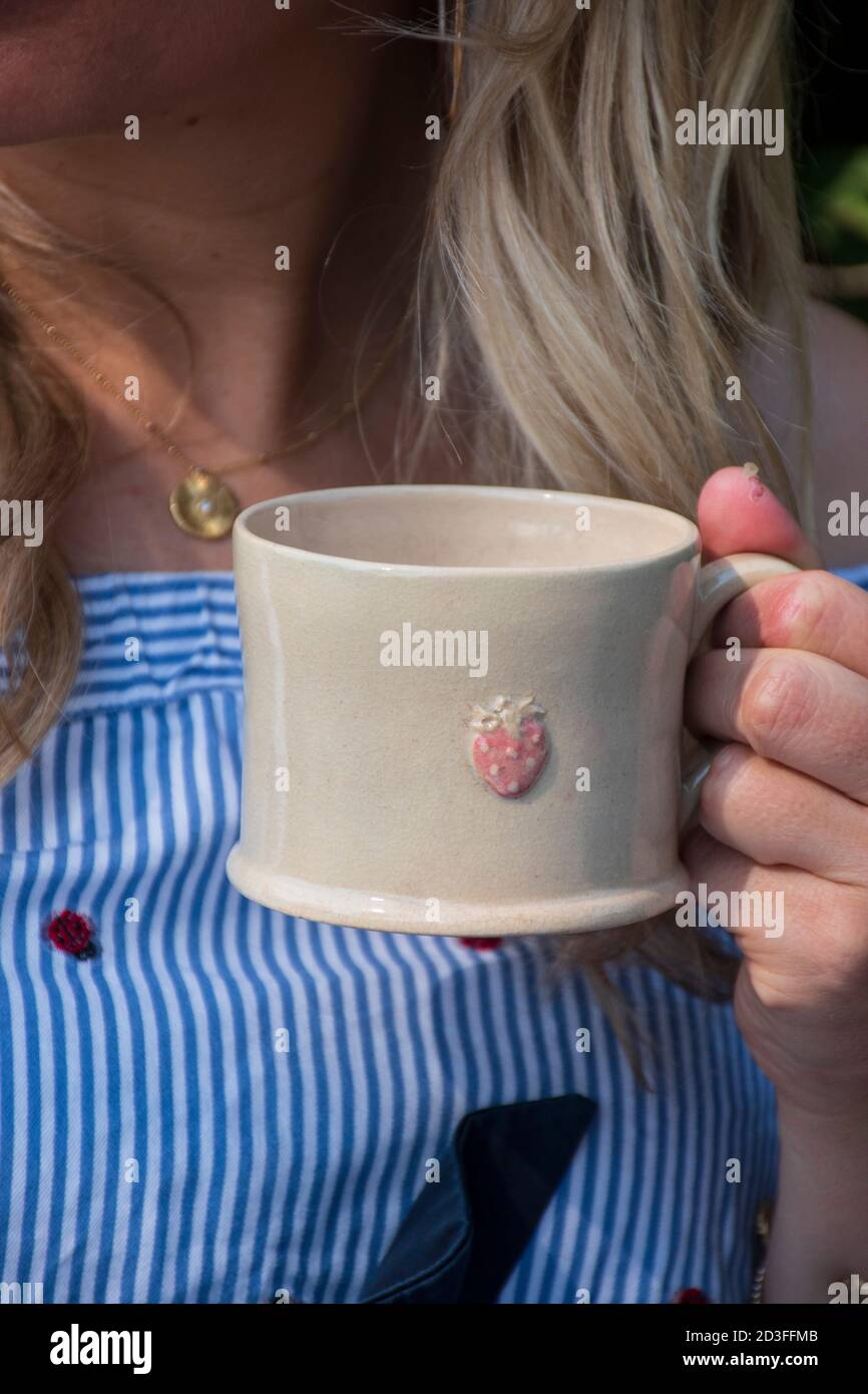 woman reading a notebook on the bench Stock Photo - Alamy