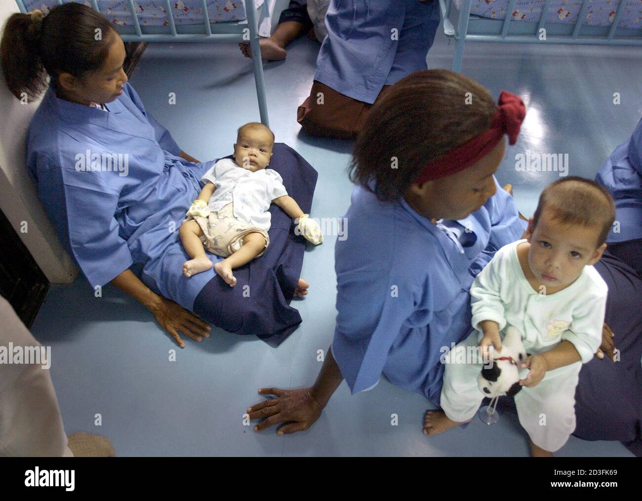 Female inmates in jail uniforms hi-res stock photography and images - Alamy