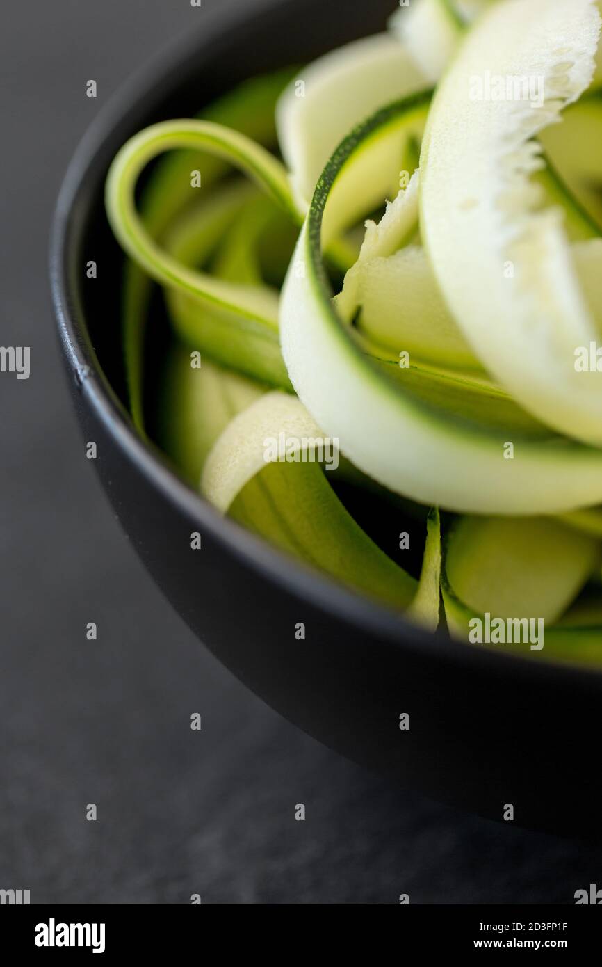 peeled or sliced zucchini in ceramic bowl Stock Photo - Alamy