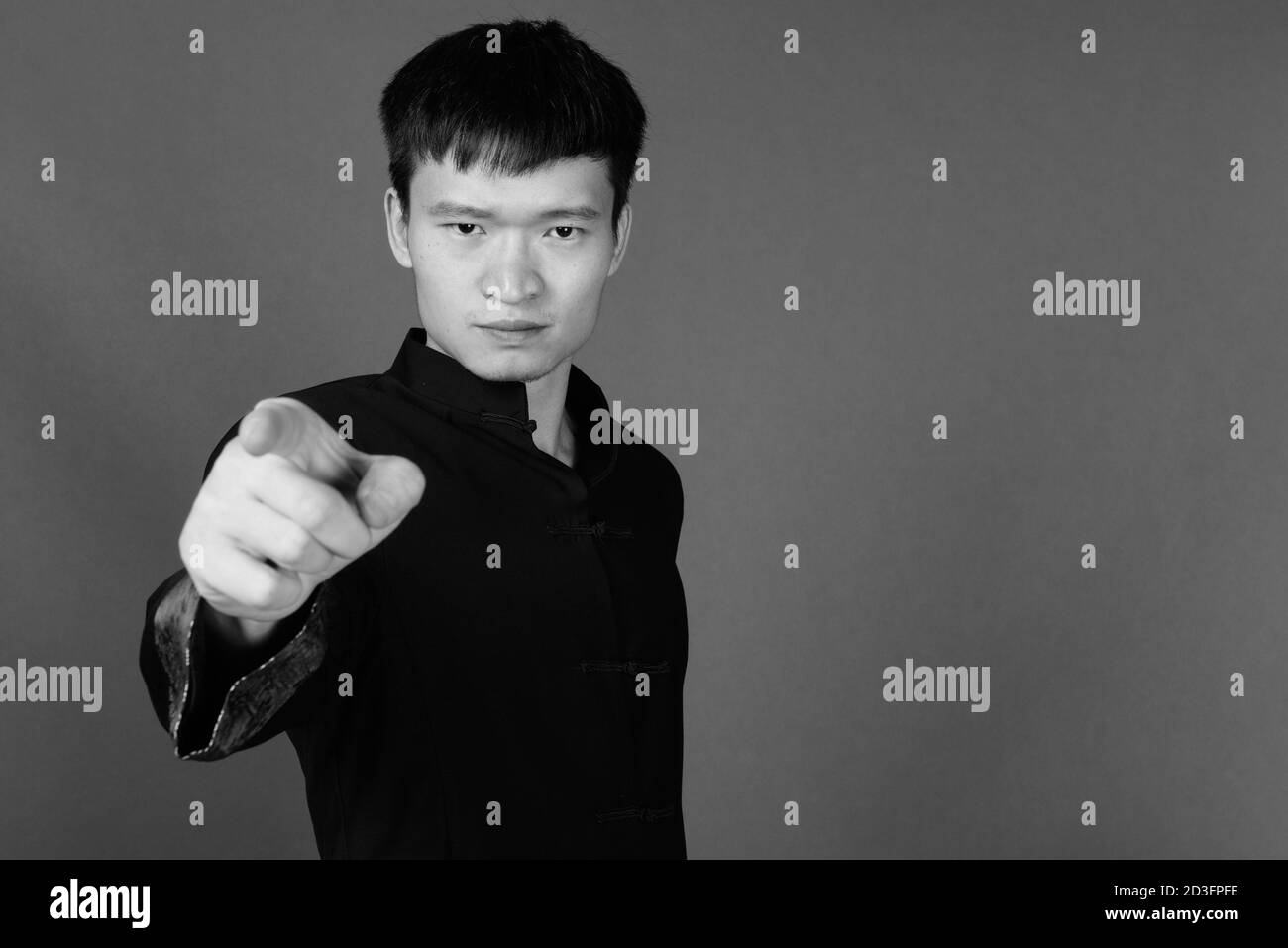 Chinese man traditional clothing white Black and White Stock Photos ...