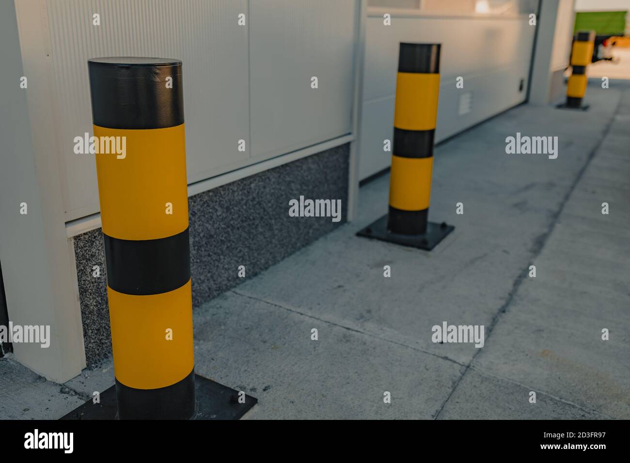 Restriction and protection poles.Protection for industrial doors Stock ...