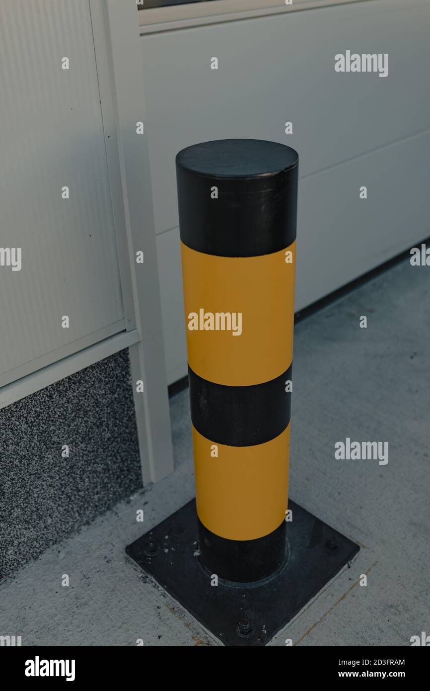 Restriction and protection poles.Protection for industrial doors Stock ...