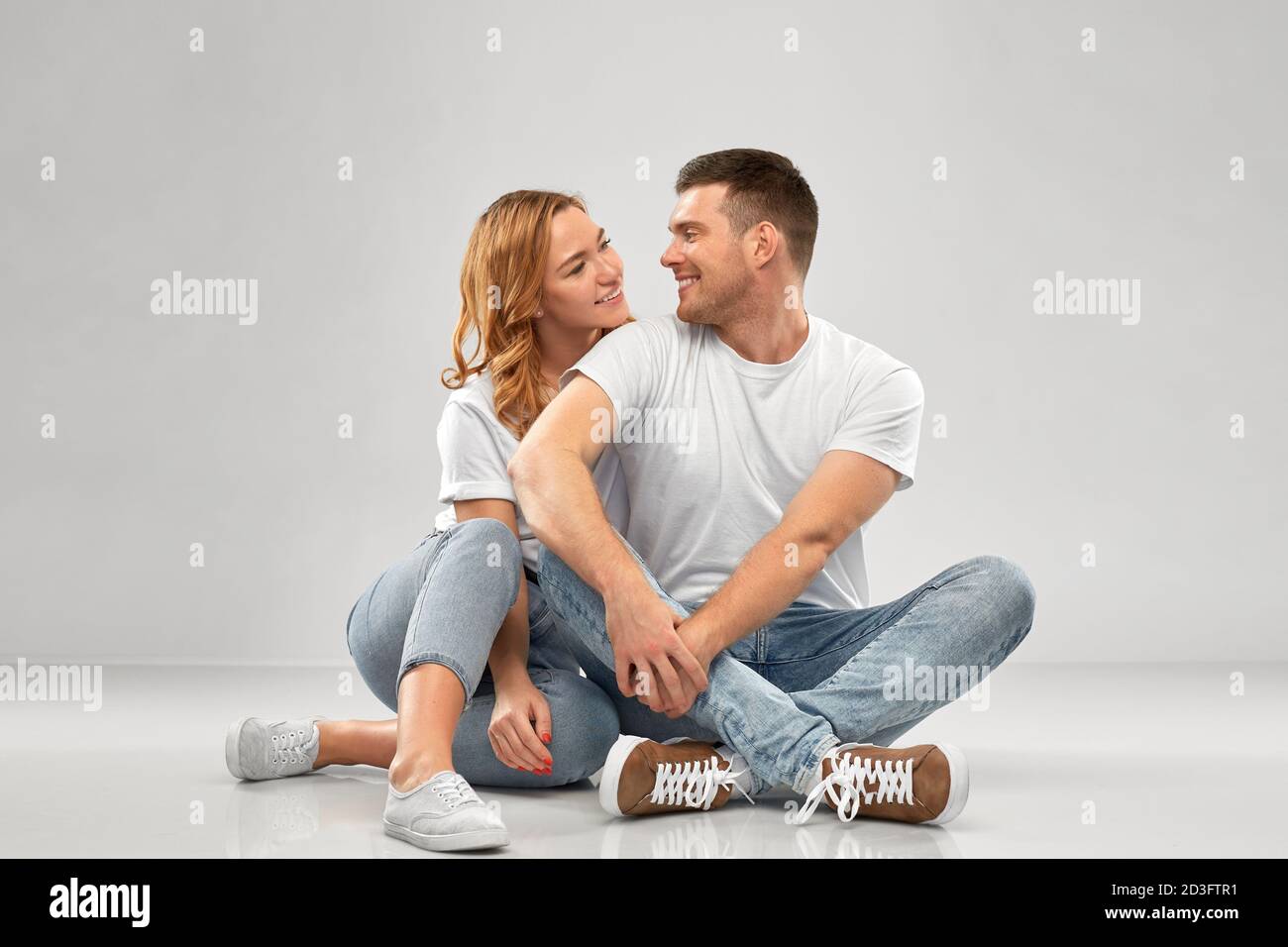 Couple in white t shirts hi-res stock photography and images - Alamy