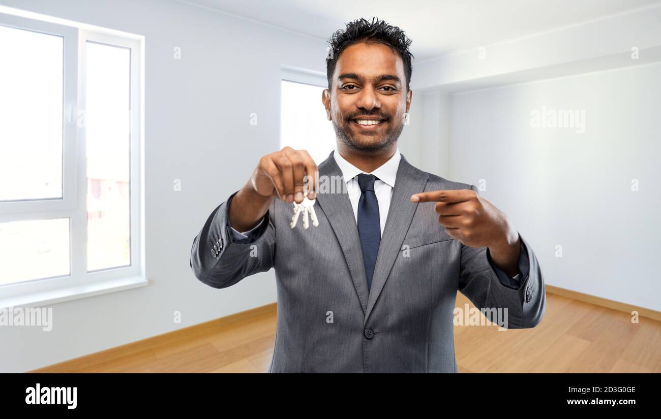 Indian business man house key hi-res stock photography and images - Alamy