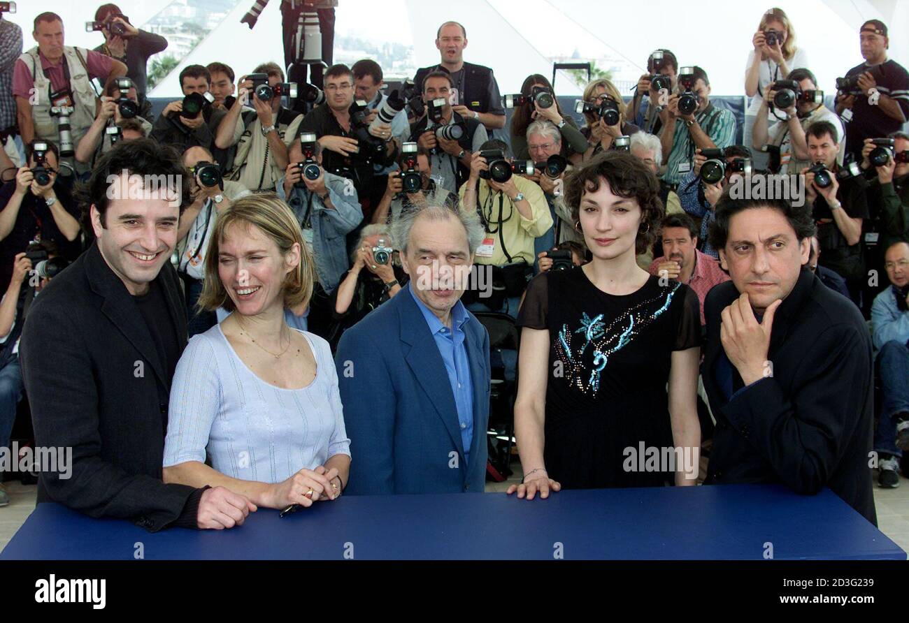 French director Jacques Rivette (C) stands with cast members from L-R ...