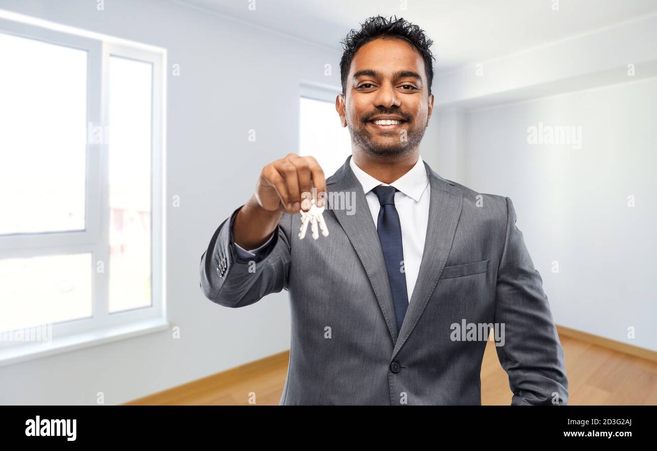 Indian business man house key hi-res stock photography and images - Alamy