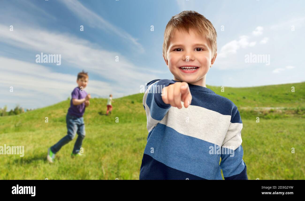 little boy pointing finger to camera outdoors Stock Photo - Alamy