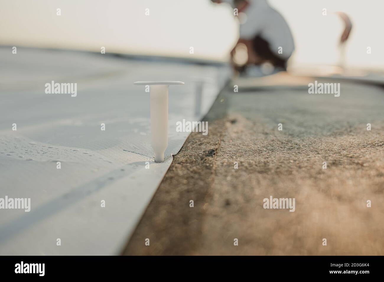 Synthetic pvc membrane fixed with dowels Stock Photo - Alamy