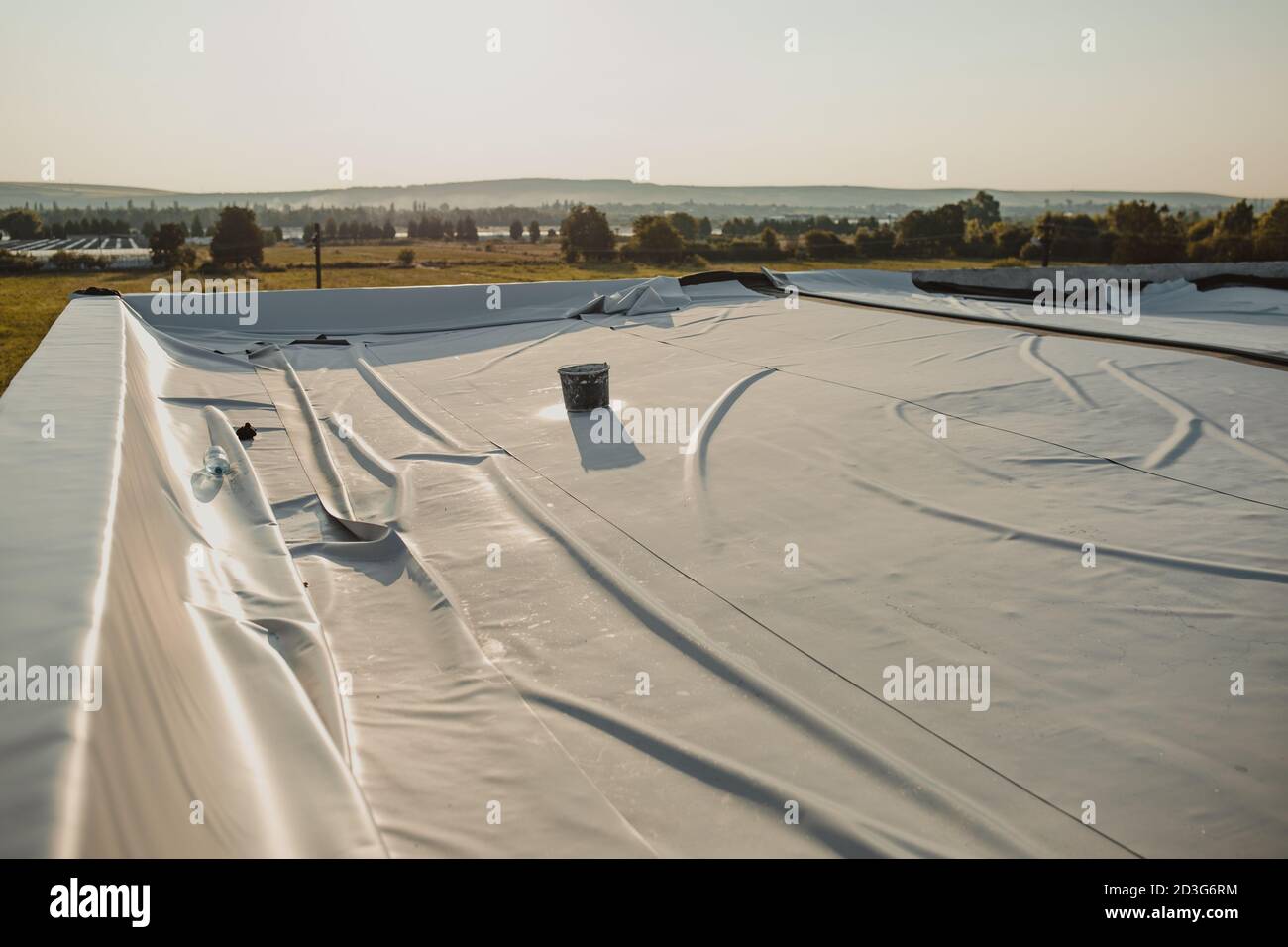 Water resistant tpo membrane positioned on the roof. PVC and rubber ...