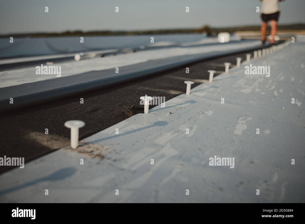 Synthetic pvc membrane fixed with dowels Stock Photo - Alamy