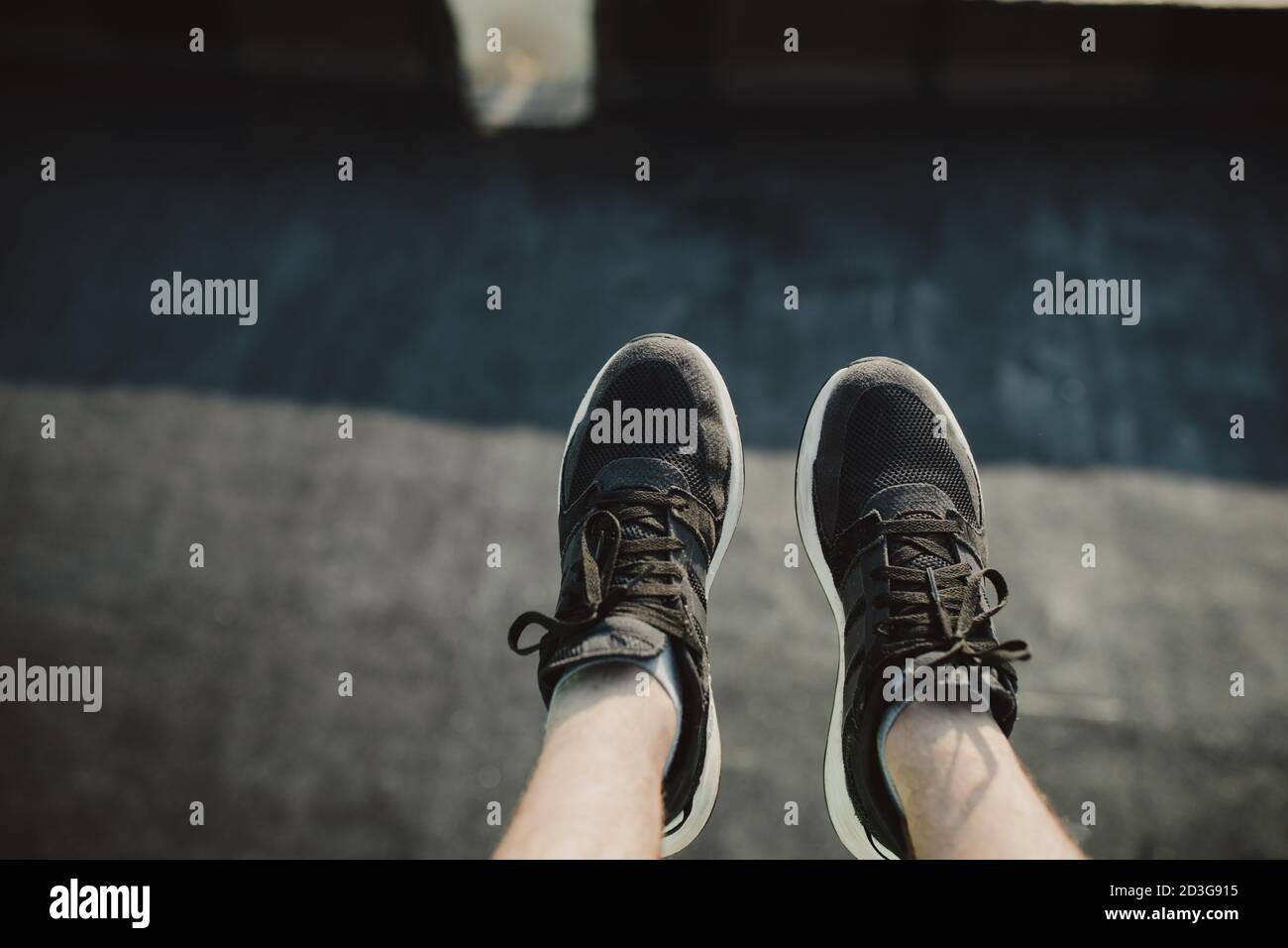 Legs over edge hi-res stock photography and images - Alamy
