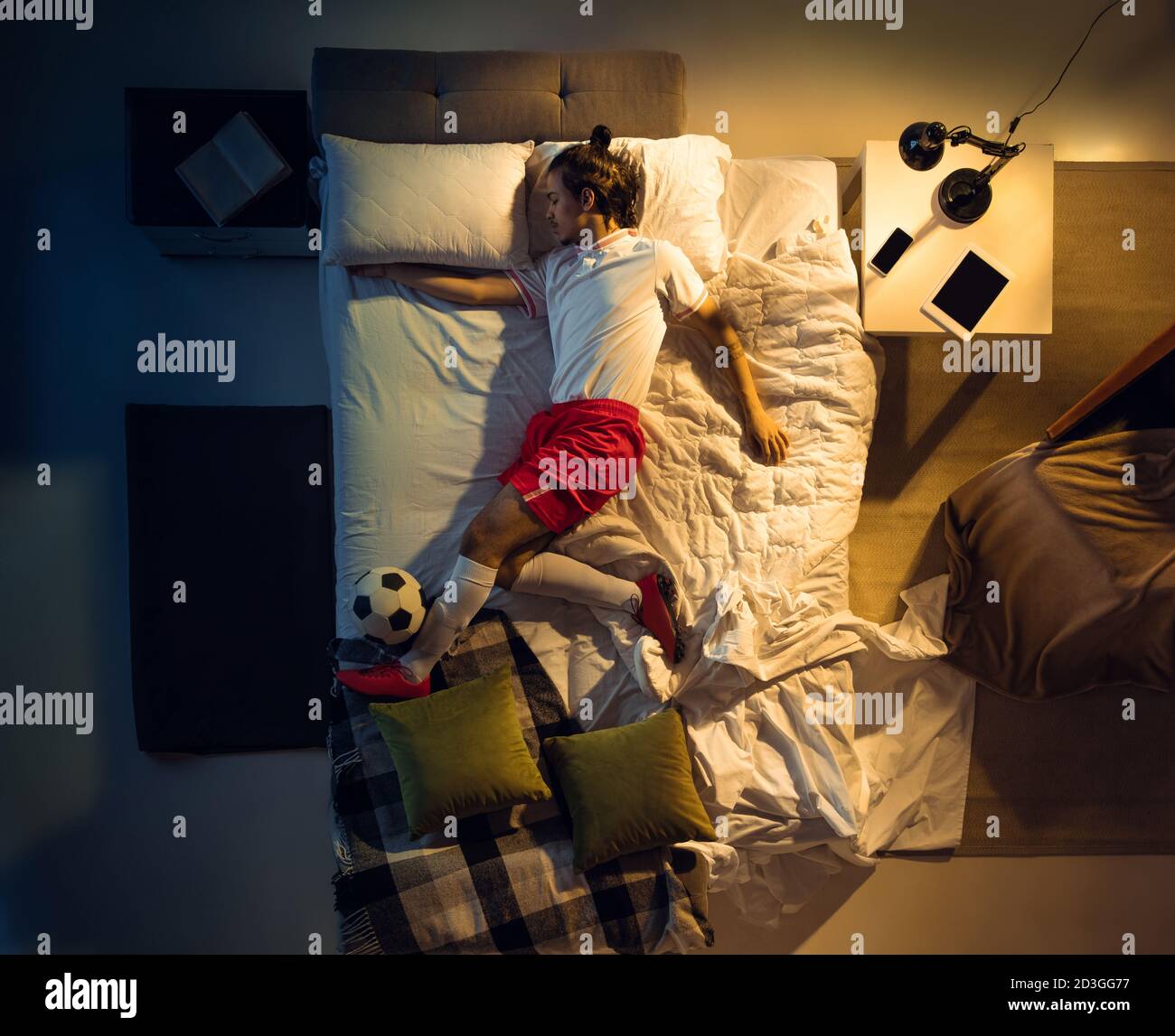 Man lying in bed football hi-res stock photography and images - Alamy