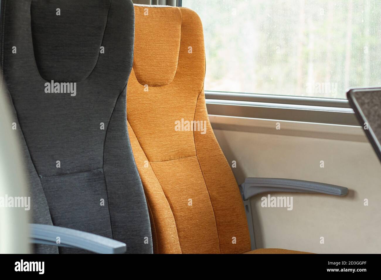 Railroad train interior seats and window. Inside of russian suburban ...