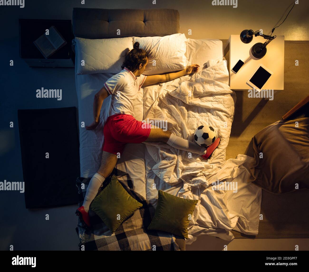 Man lying in bed football hi-res stock photography and images - Alamy