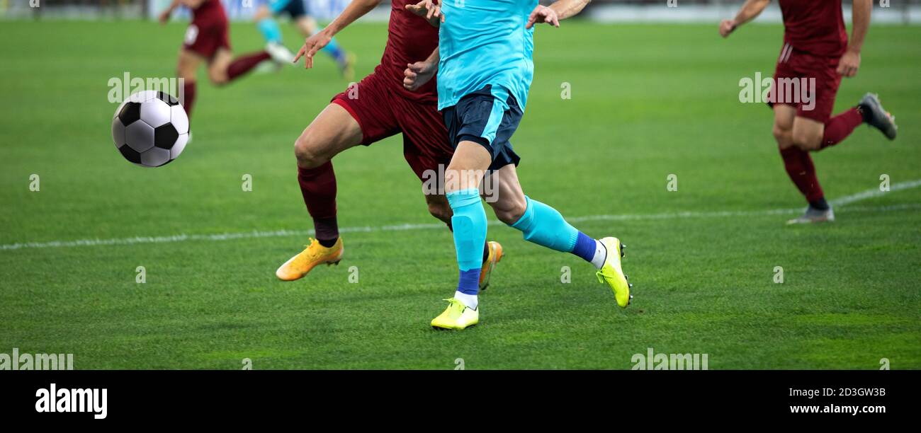 Silhouette soccer players fighting ball hi-res stock photography and ...