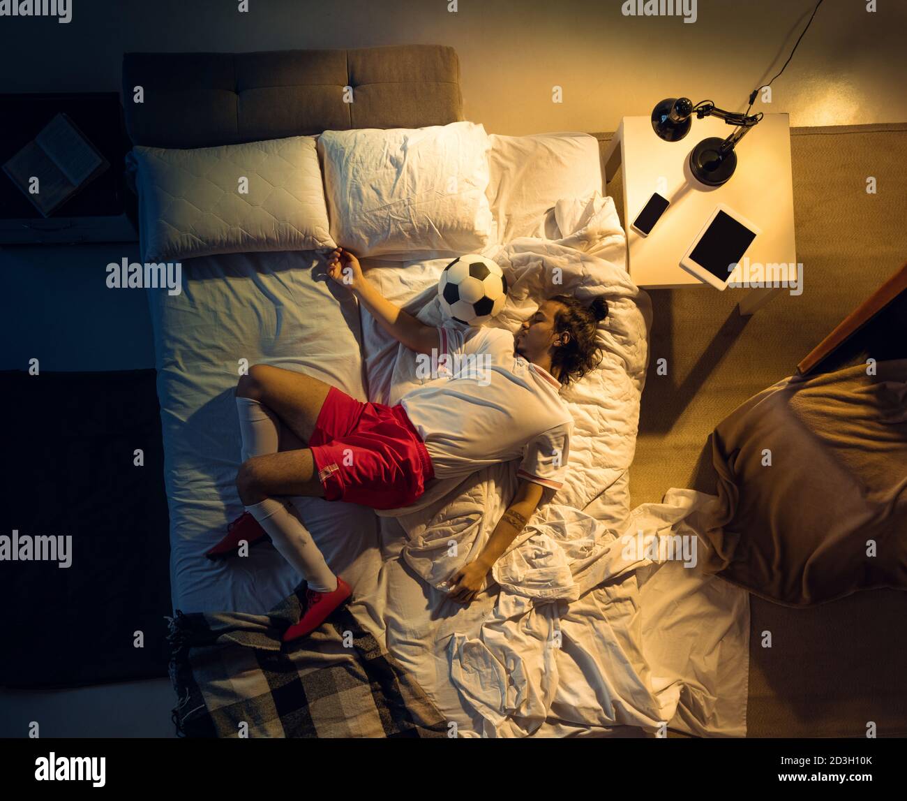 Man lying in bed football hi-res stock photography and images - Alamy