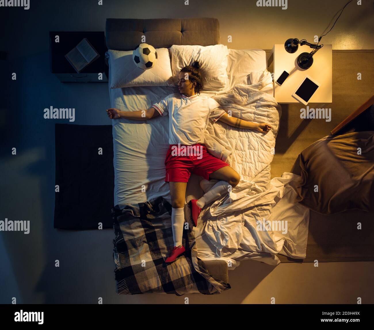 Champion. Top view of young professional football, soccer player ...