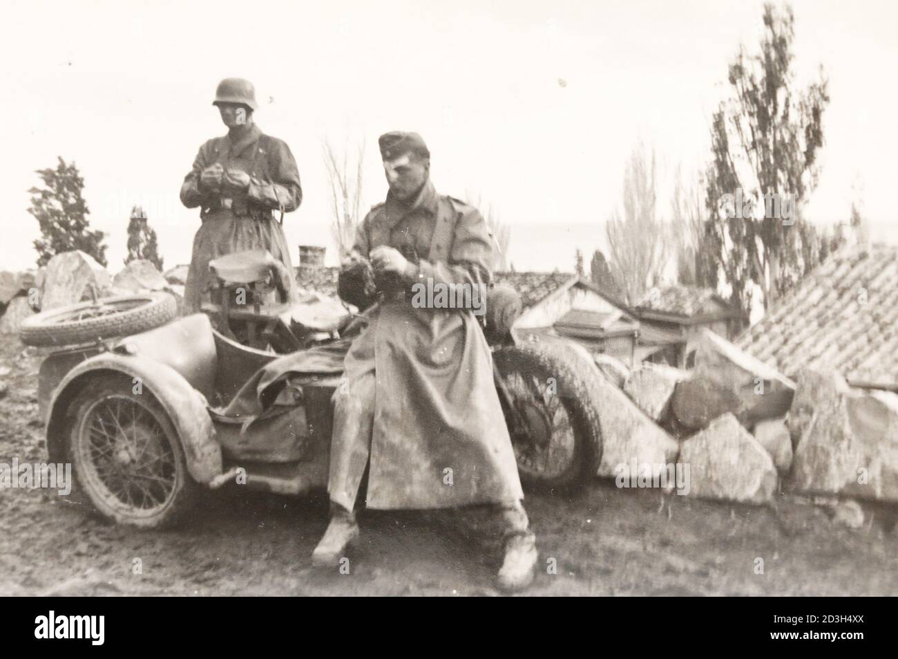 German soldiers with a motorcycle during the World War II Stock Photo ...
