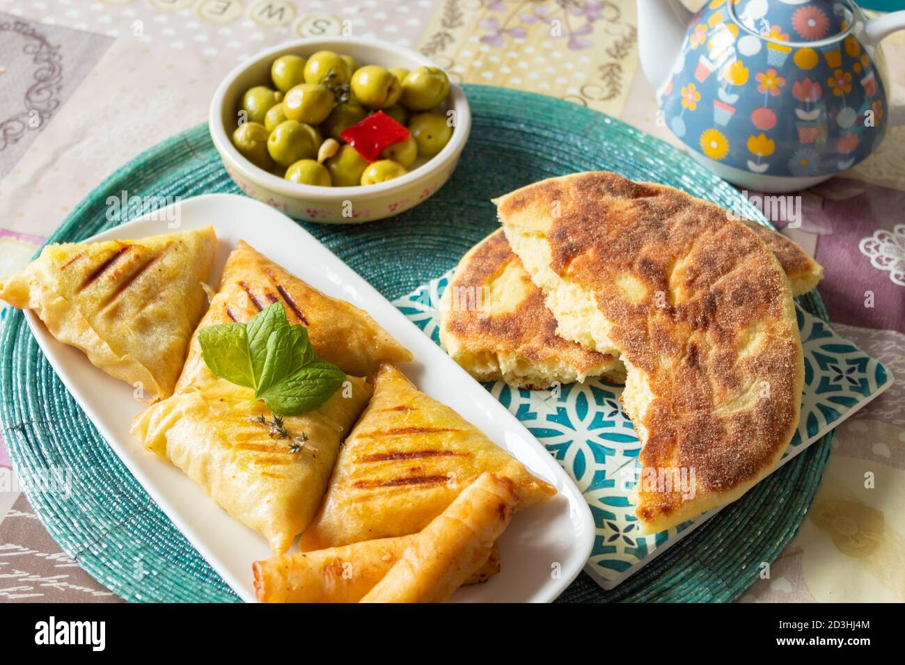 Arab chicken briwats on white plate Stock Photo - Alamy