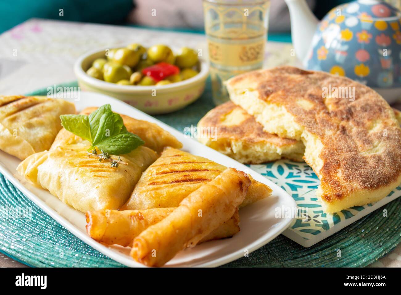 Arab chicken briwats on white plate Stock Photo - Alamy