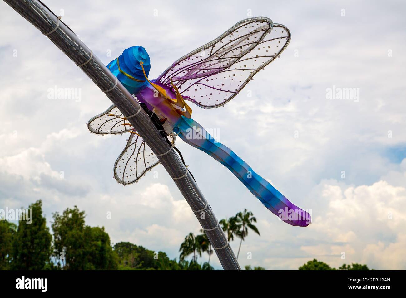 Low angle shot of a huge dragonfly sculpture located in the Gardens by ...