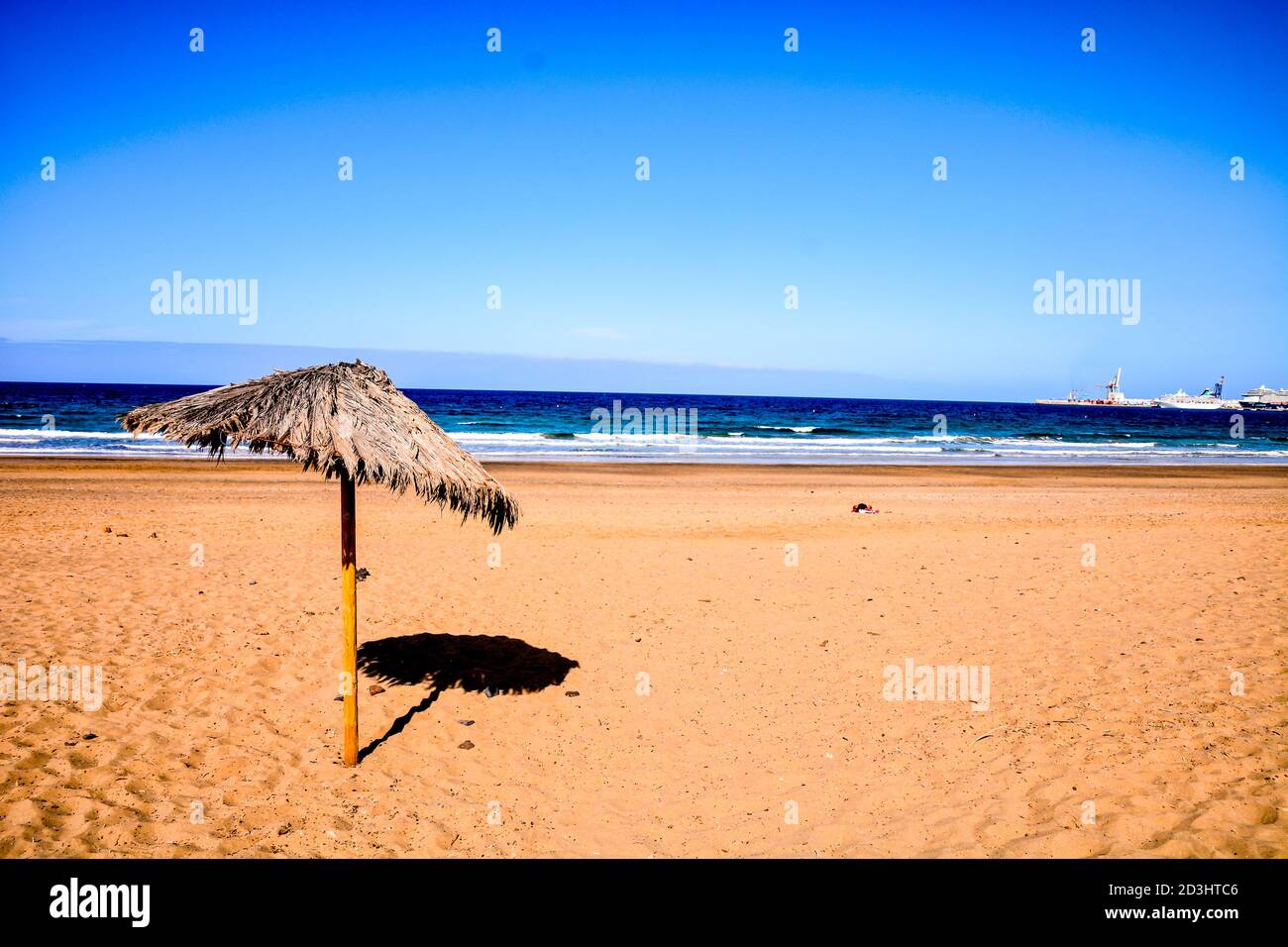 Tropical Beach Umbrella Stock Photo - Alamy