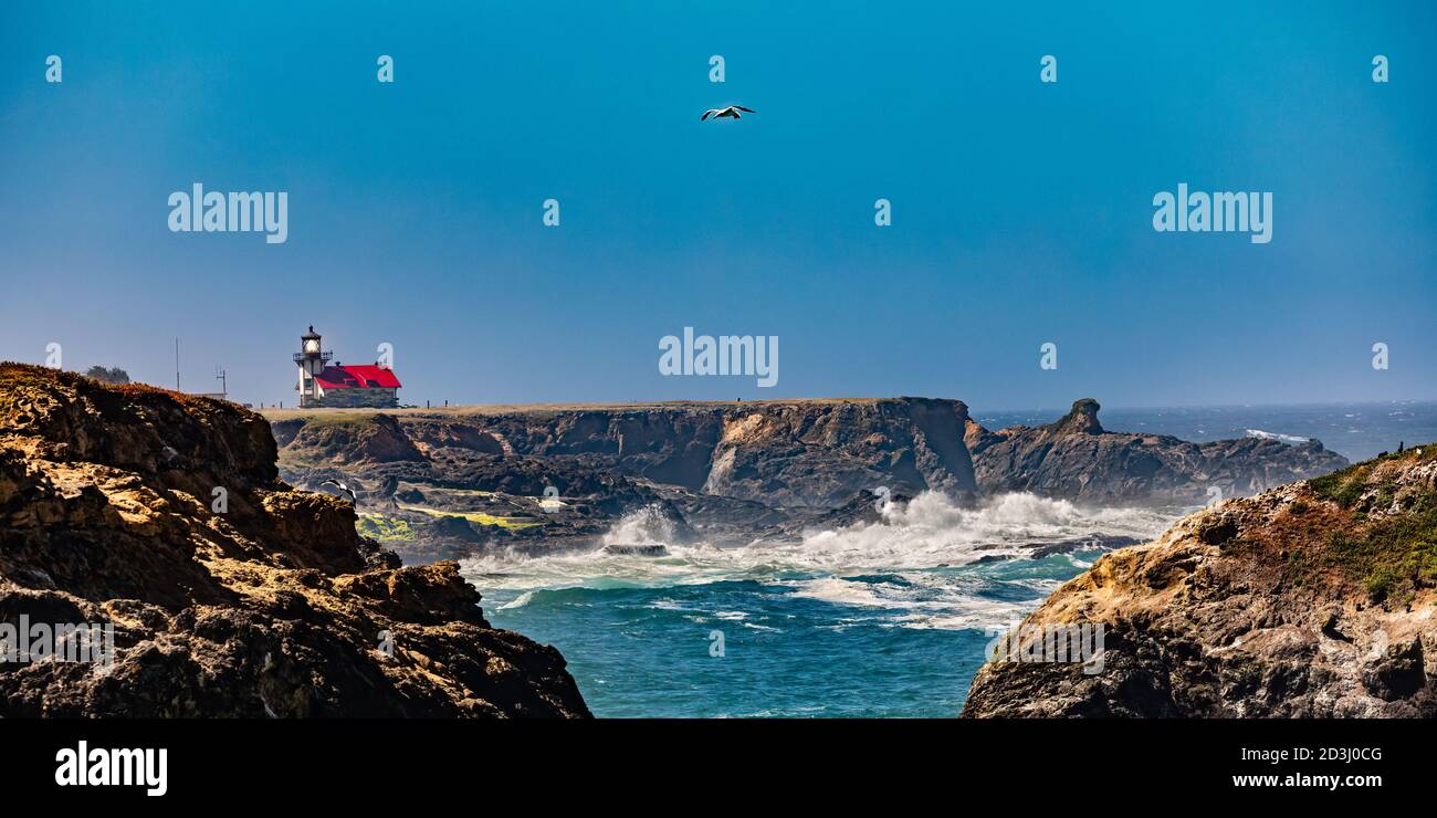 Lighthouse with red roof Stock Photo - Alamy