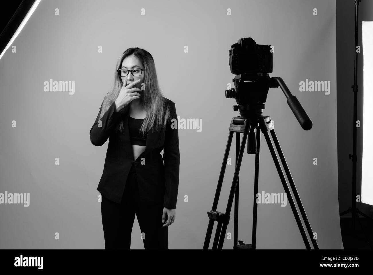 Portrait of young Asian businesswoman vlogging with camera Stock Photo ...